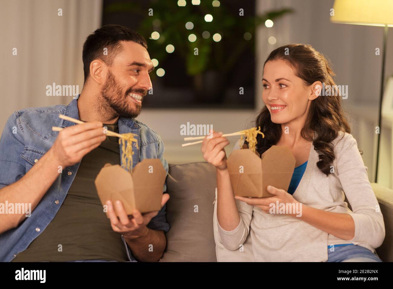 Asian couple eating noodles hi-res stock photography and images - Alamy