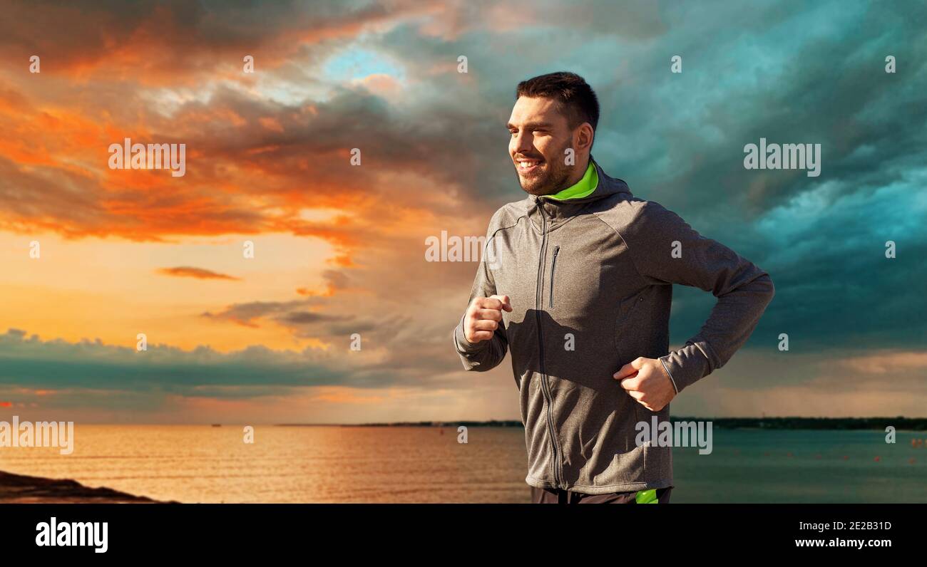 Happy guy over sea hi-res stock photography and images - Alamy