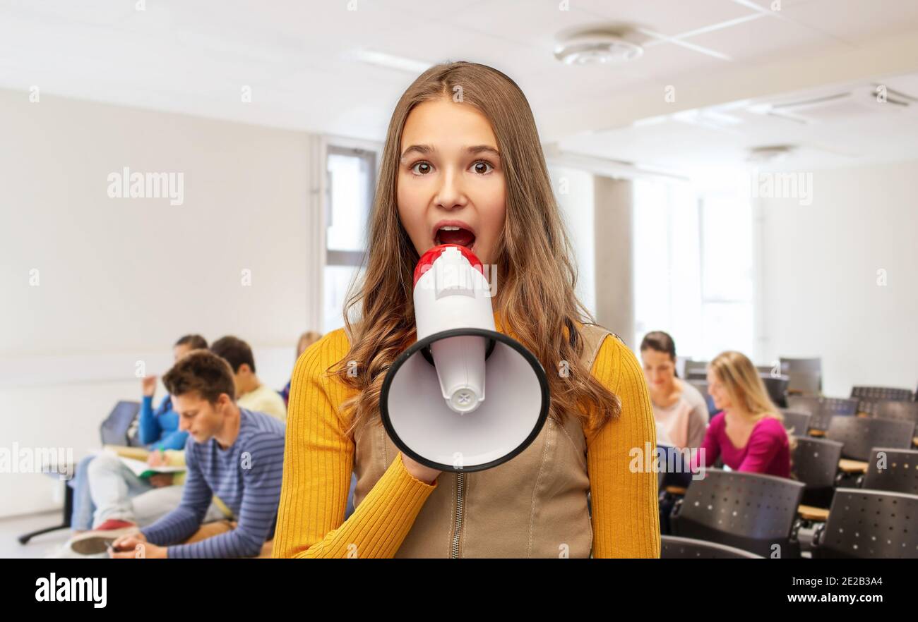 teenage girl speaking to megaphone at school Stock Photo - Alamy