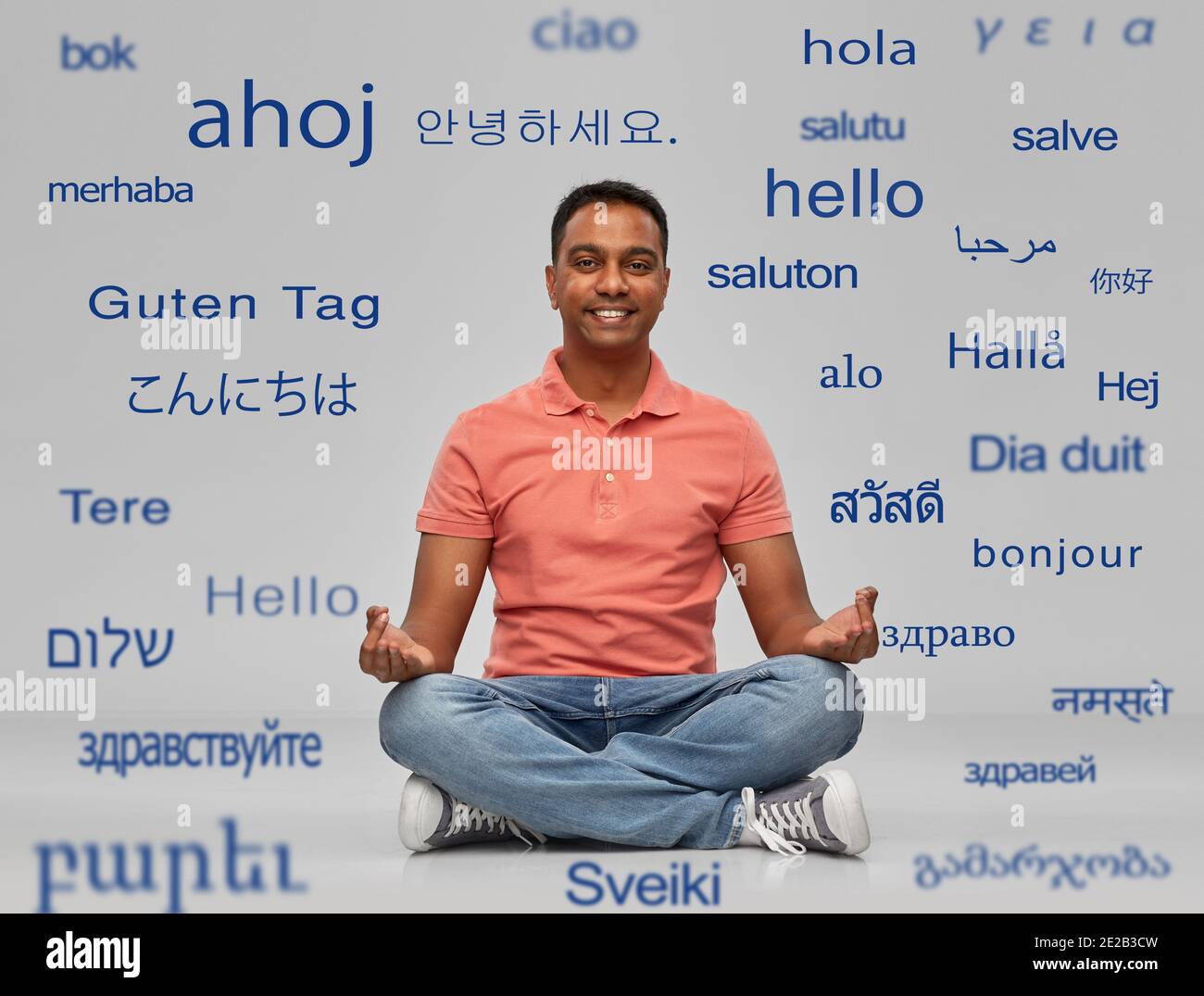 happy indian man over words in foreign languages Stock Photo - Alamy