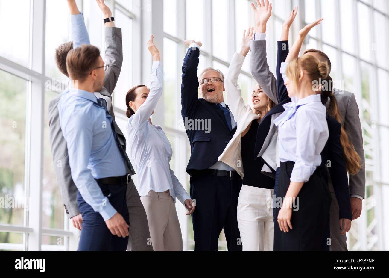 business people celebrating success at office Stock Photo - Alamy