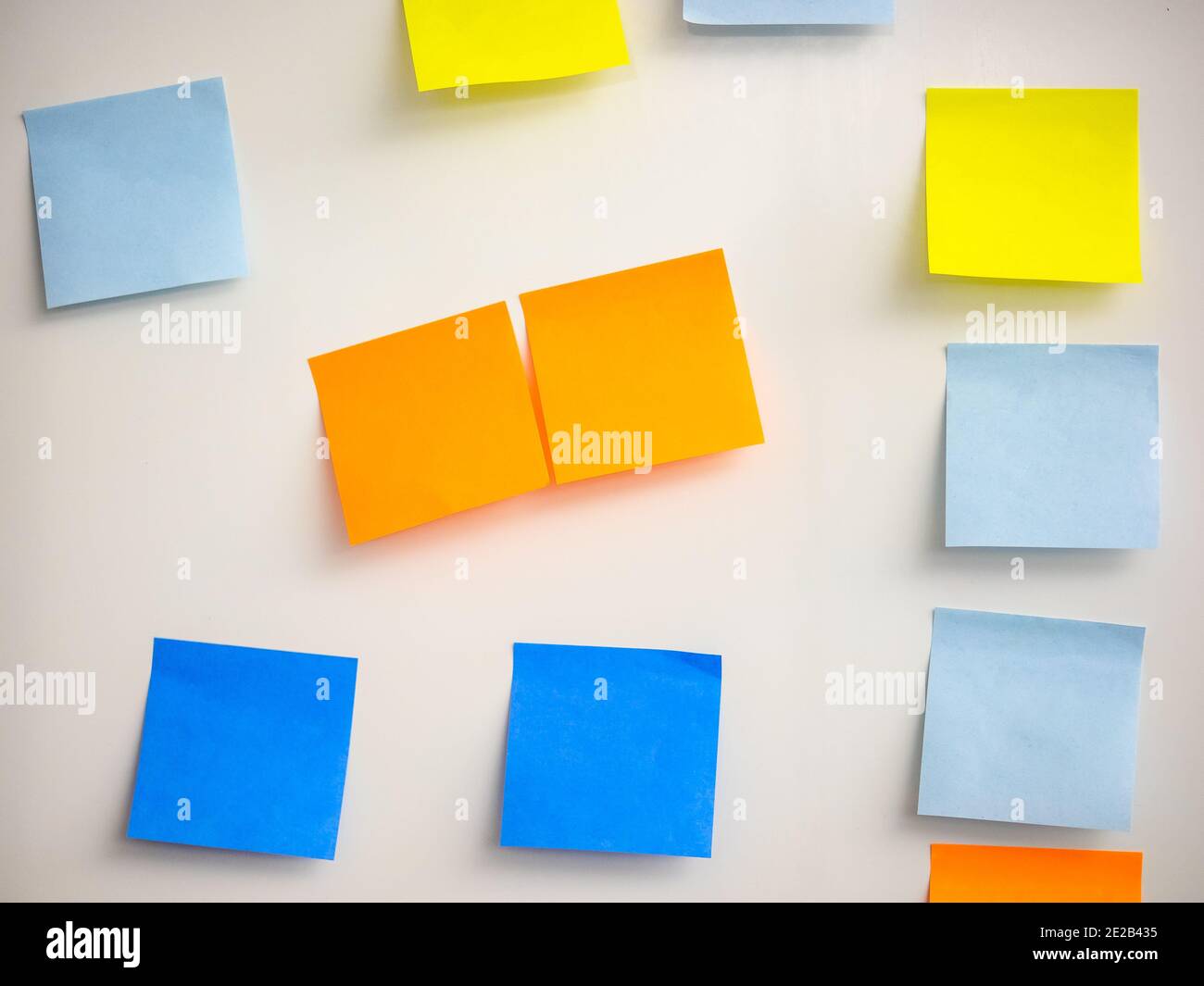 Image of different colour stickers on the whiteboard Stock Photo - Alamy