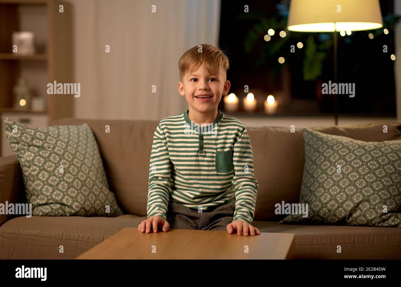 happy smiling little boy at home at night Stock Photo - Alamy