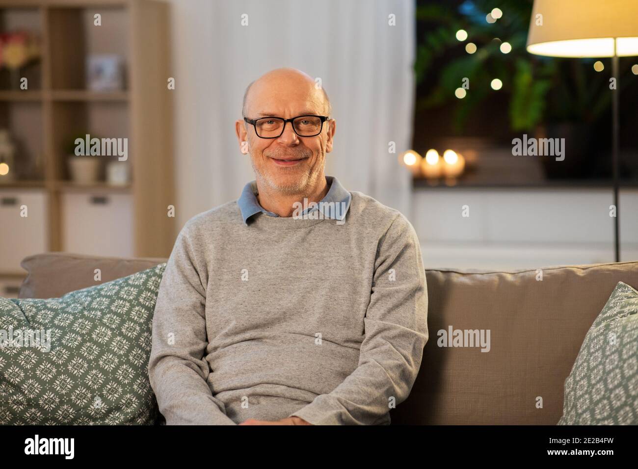 Smiling bald man in glasses hi-res stock photography and images - Alamy