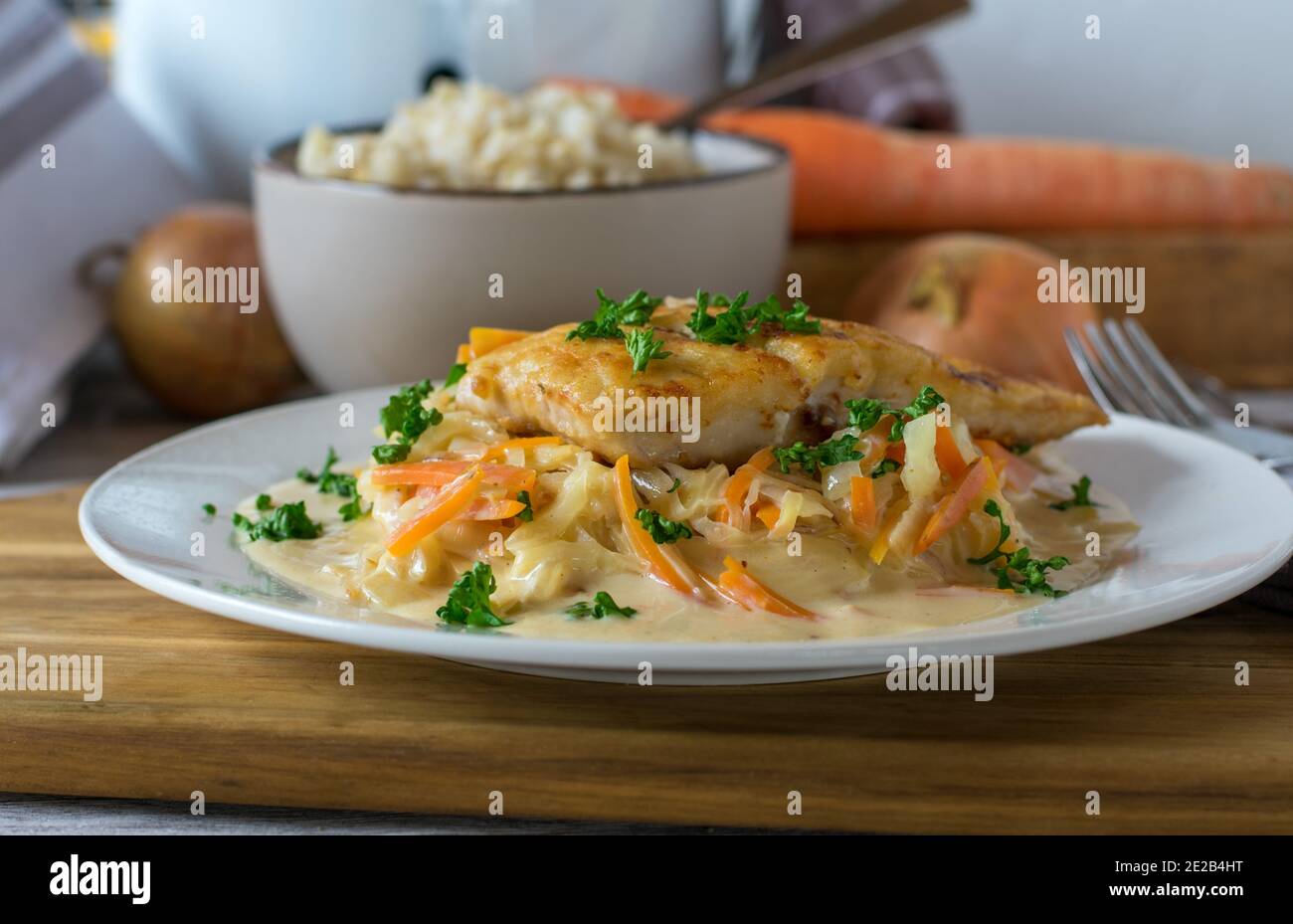 fish with brown rice and vegetables Stock Photo - Alamy