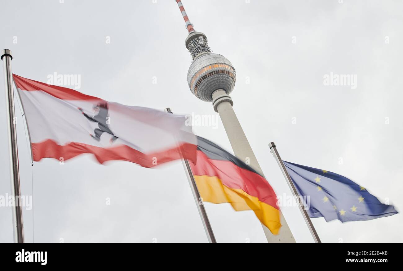 Berlin, Germany. 13th Jan, 2021. The flags of Berlin (l-r), Germany and ...