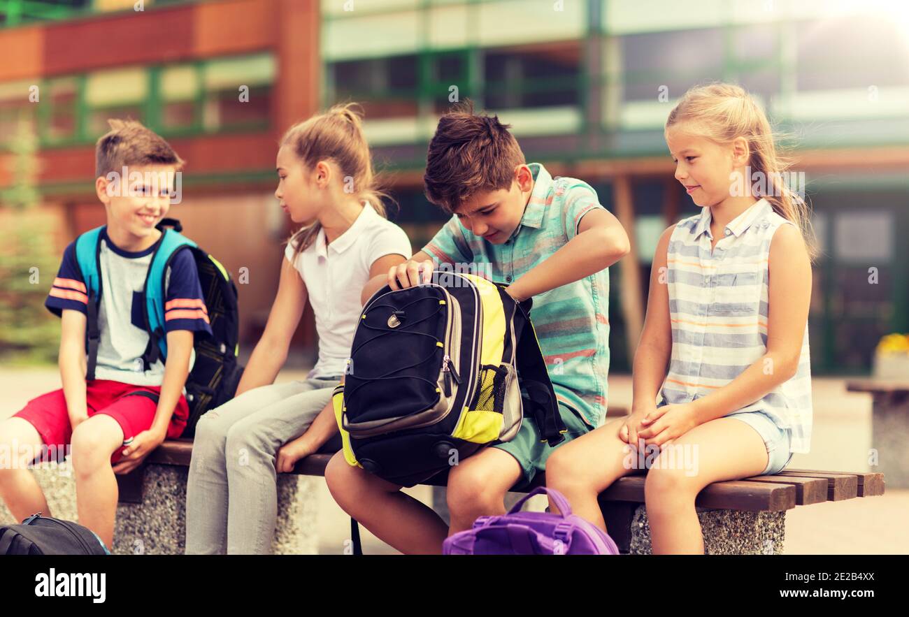 Students with backpacks hi-res stock photography and images - Alamy