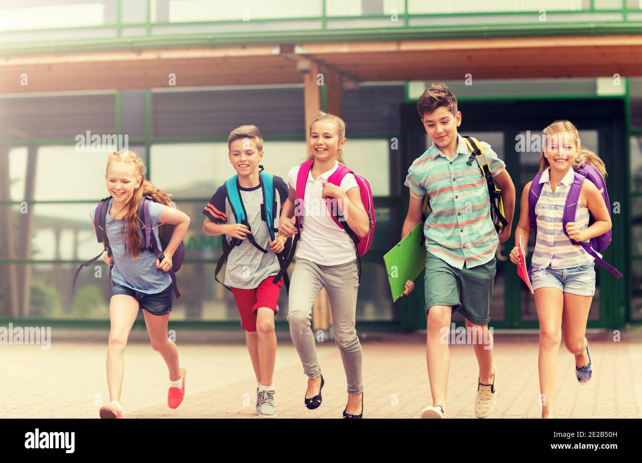Running teenager school hi-res stock photography and images - Alamy