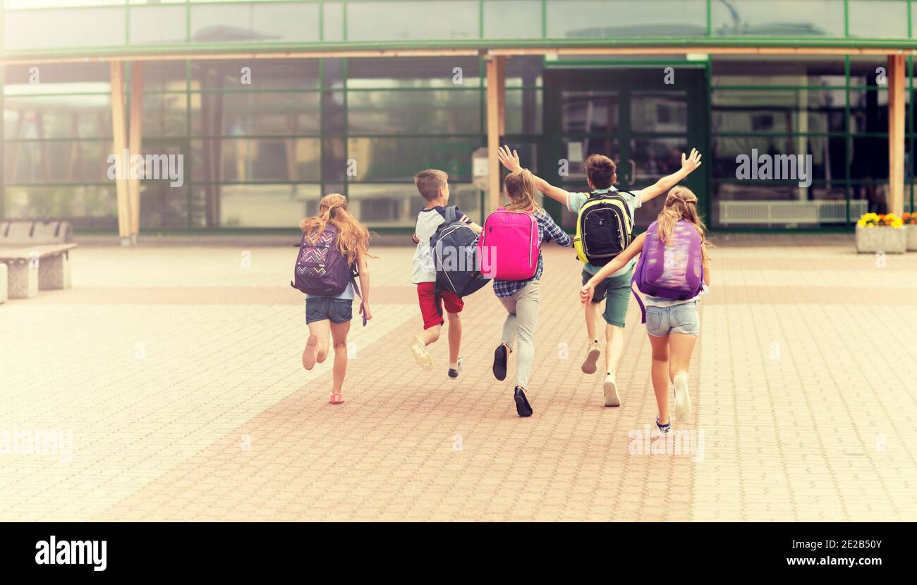Boy running with bag hi-res stock photography and images - Alamy
