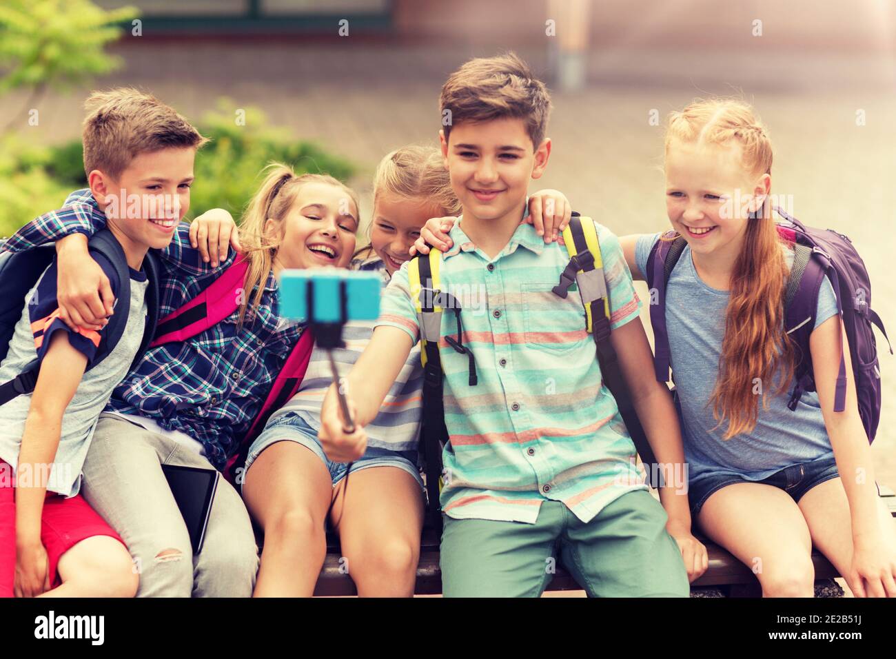 happy elementary school students taking selfie Stock Photo - Alamy