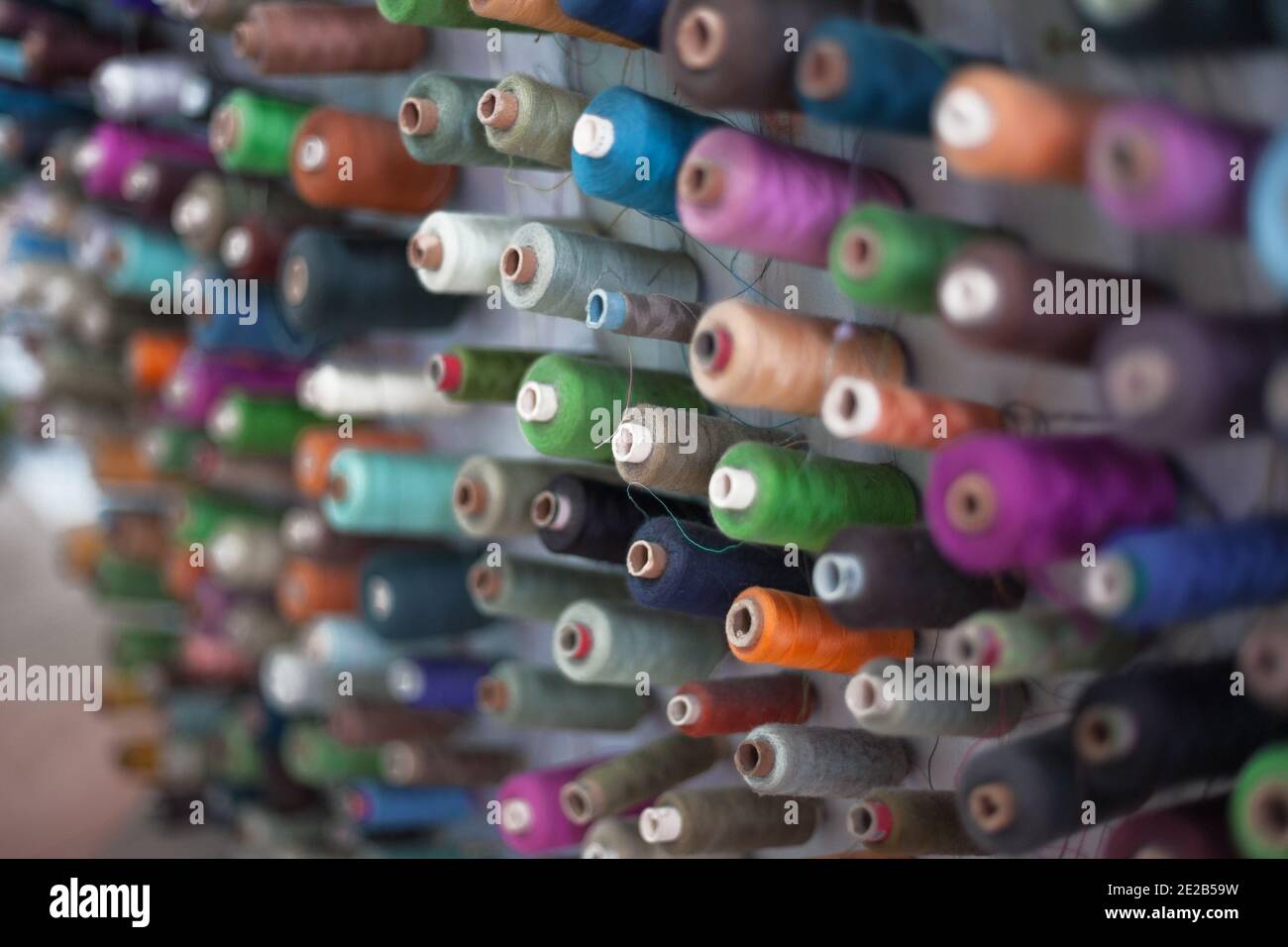 Closeup shot thread rolls hi-res stock photography and images - Alamy