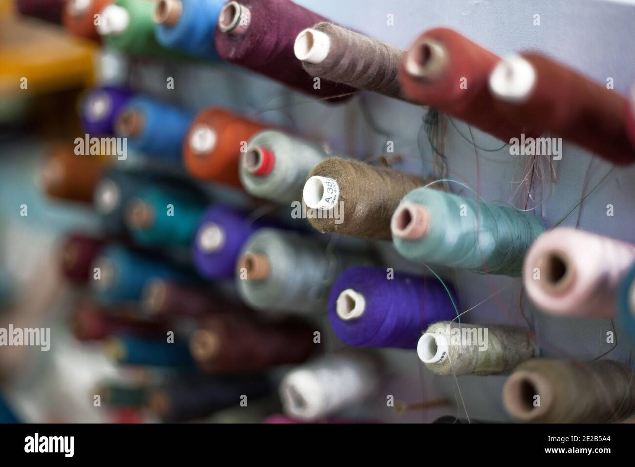 Closeup shot thread rolls hi-res stock photography and images - Alamy