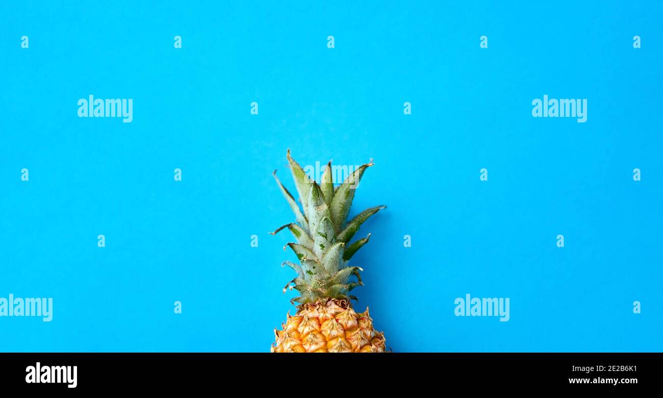 Pineapple blue background hi-res stock photography and images - Alamy