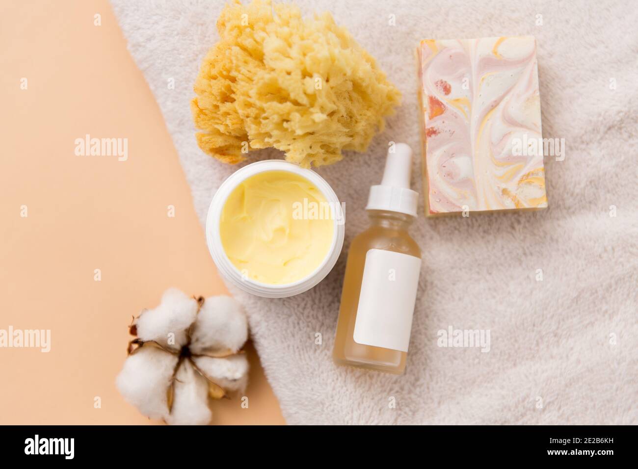 Sponge with bath towel hi-res stock photography and images - Alamy