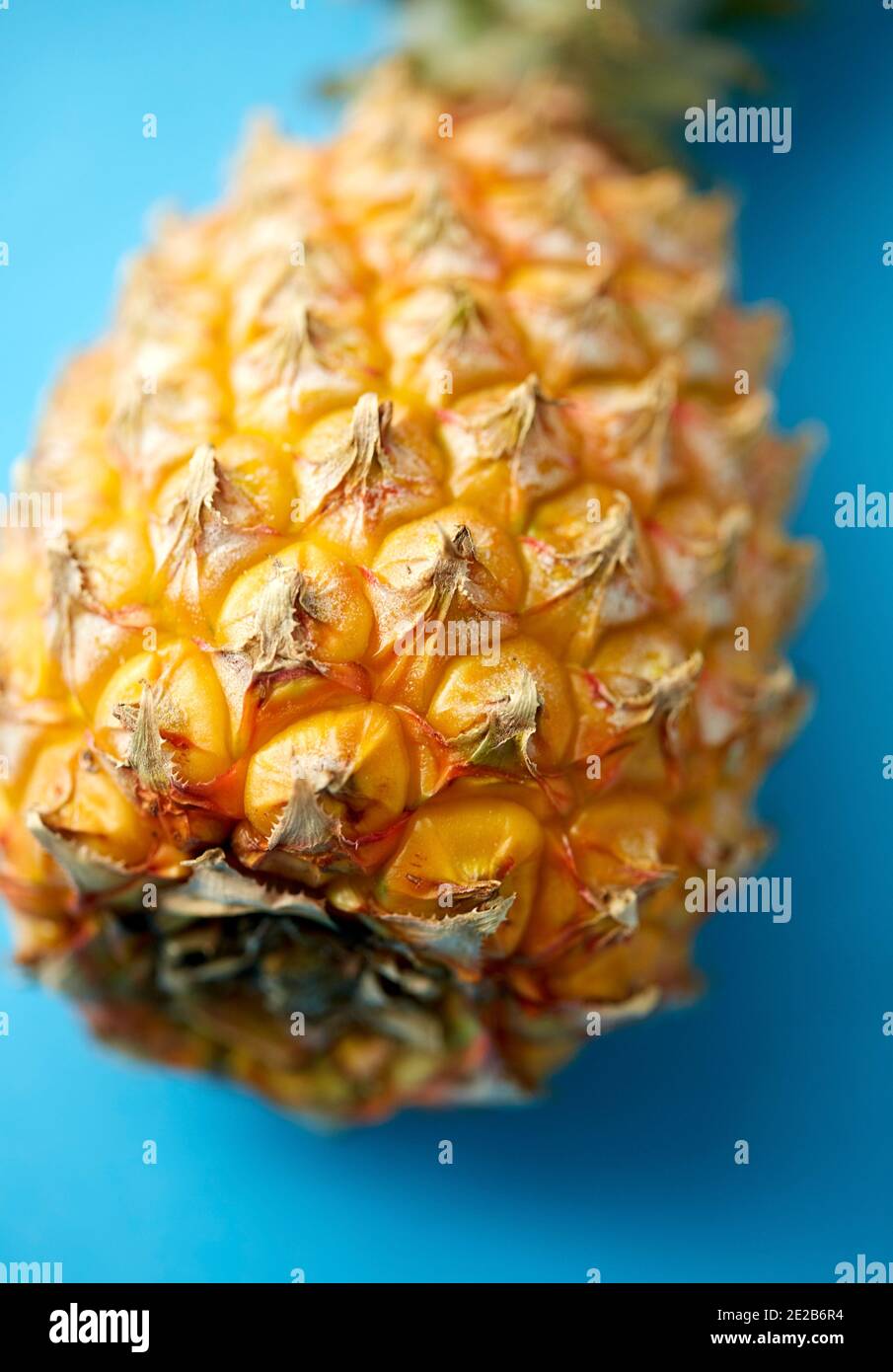 Pineapple blue background hi-res stock photography and images - Alamy