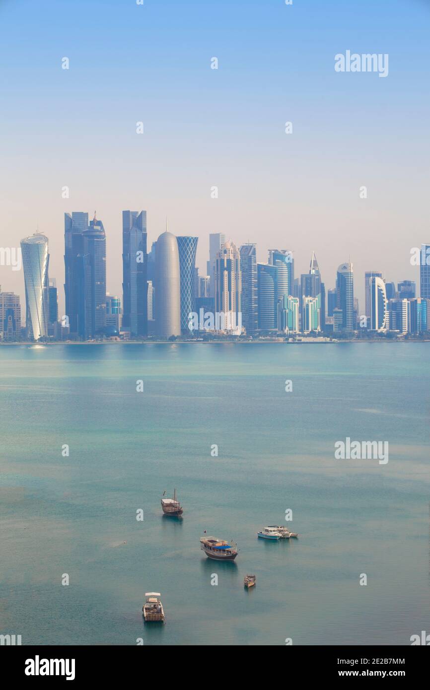 Qatar, Doha, looking across Doha Bay to skyscrapers of West Bay Stock ...