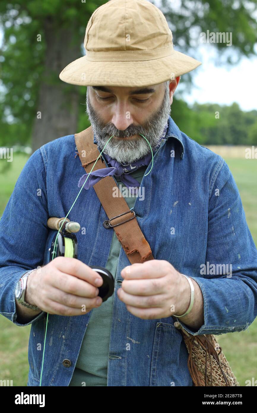 Fly Fishing Flies/ A man fly fishing ,setting up the fly line Stock ...