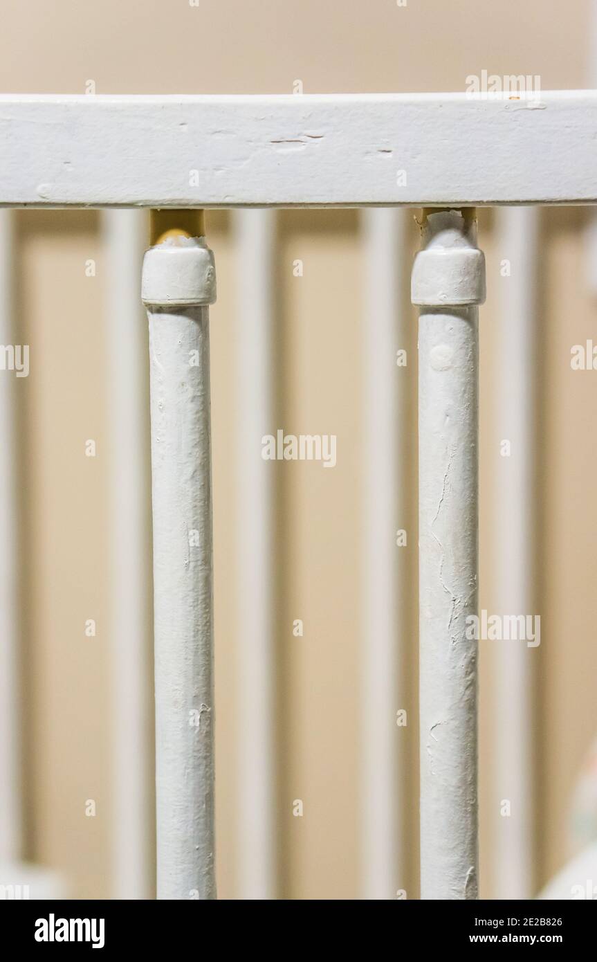 Vertical closeup of baby cradle white handrails Stock Photo - Alamy