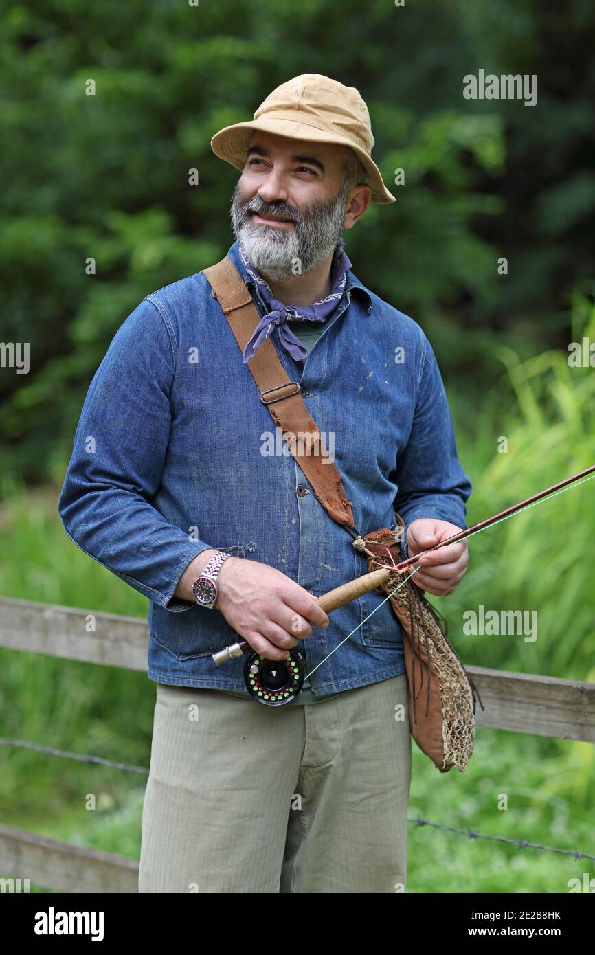 happy man fly fishing Stock Photo - Alamy