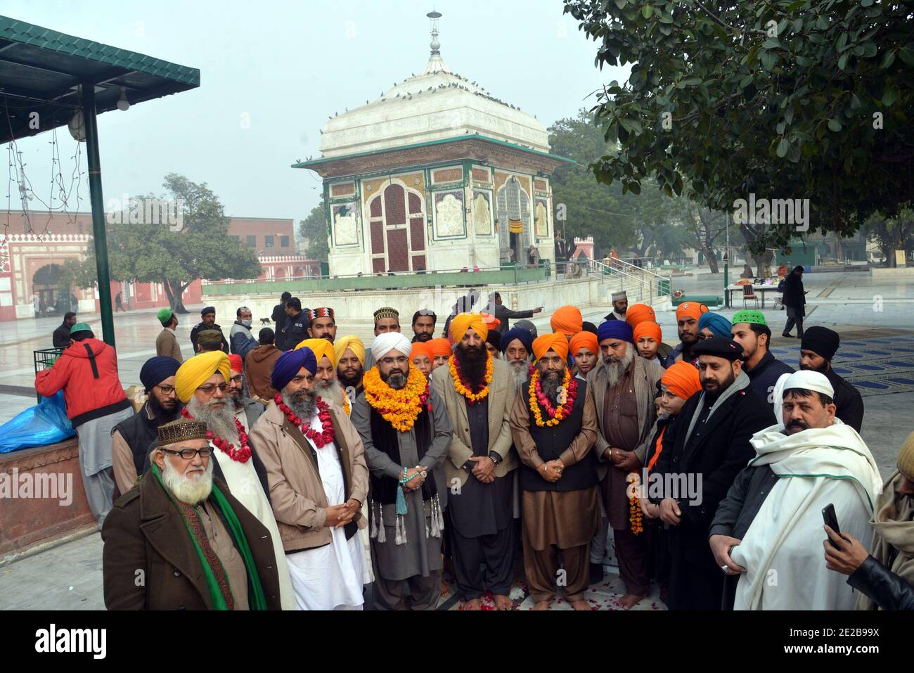 Pakistan Sikh busy in religious retuals during showered flowers on the ...