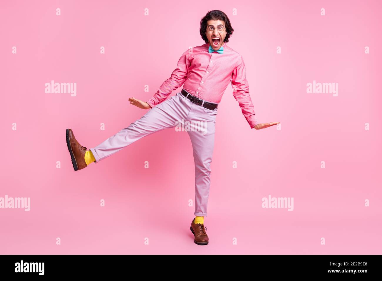 Full length photo of handsome cheerful brunet hair guy dancing standing ...