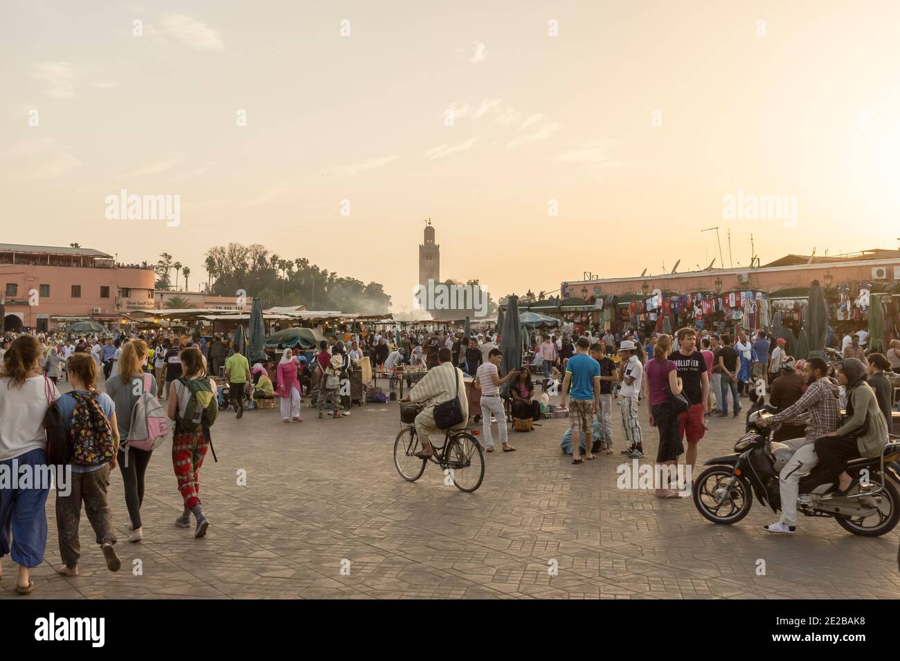 The main square of Marrakesh, Jemaa el-Fnaa, in the early evening, with ...