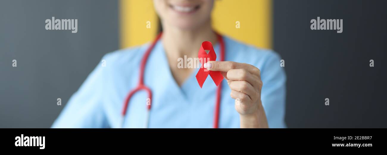 Red ribbon around neck hi-res stock photography and images - Alamy