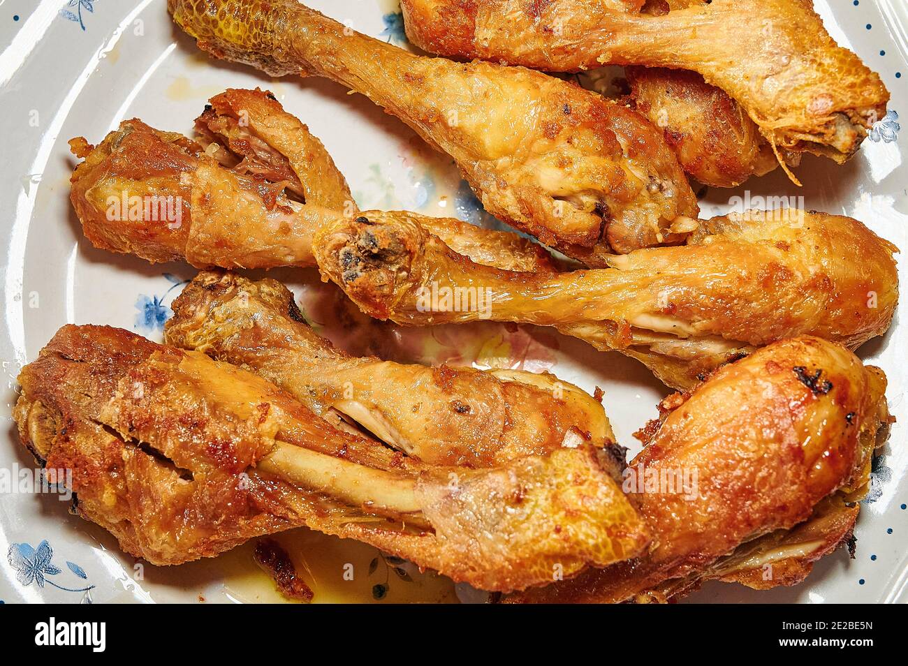 Fried chicken thigh view from above Stock Photo - Alamy