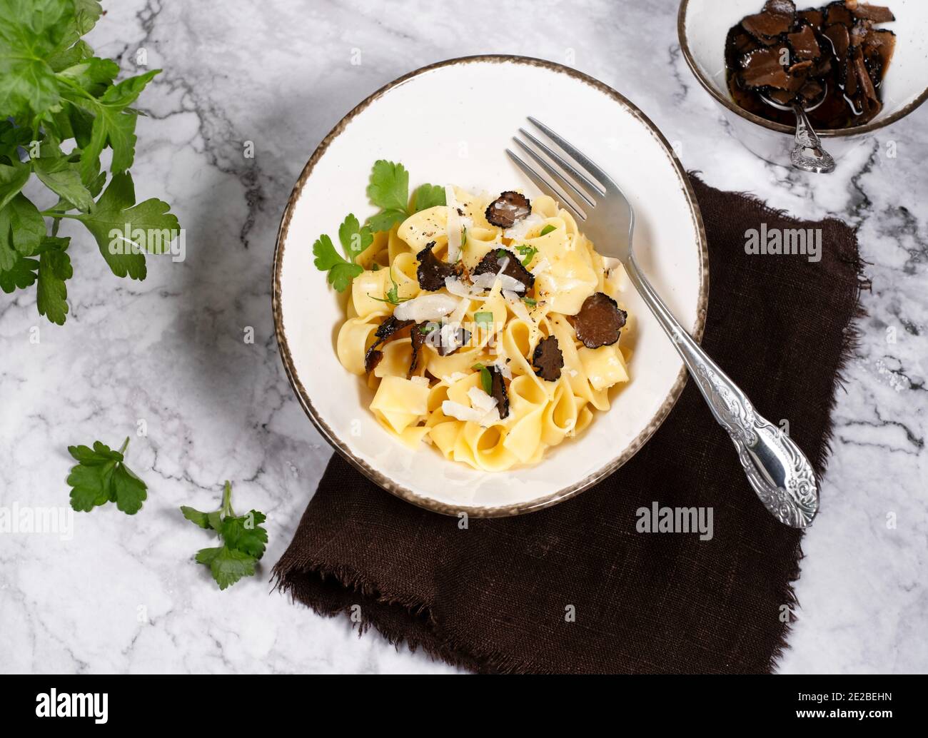 Ribbon noodles with white truffle sauce and shaved parmesan cheese ...