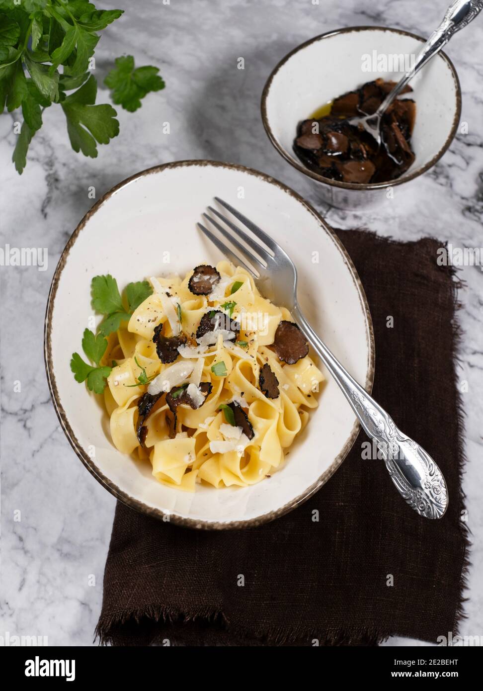 Ribbon noodles with white truffle sauce and shaved parmesan cheese ...