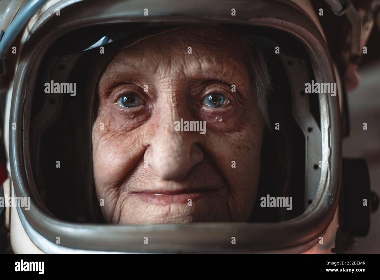 Cinematic portrait of an old astronaut coming back home. Grandmother ...