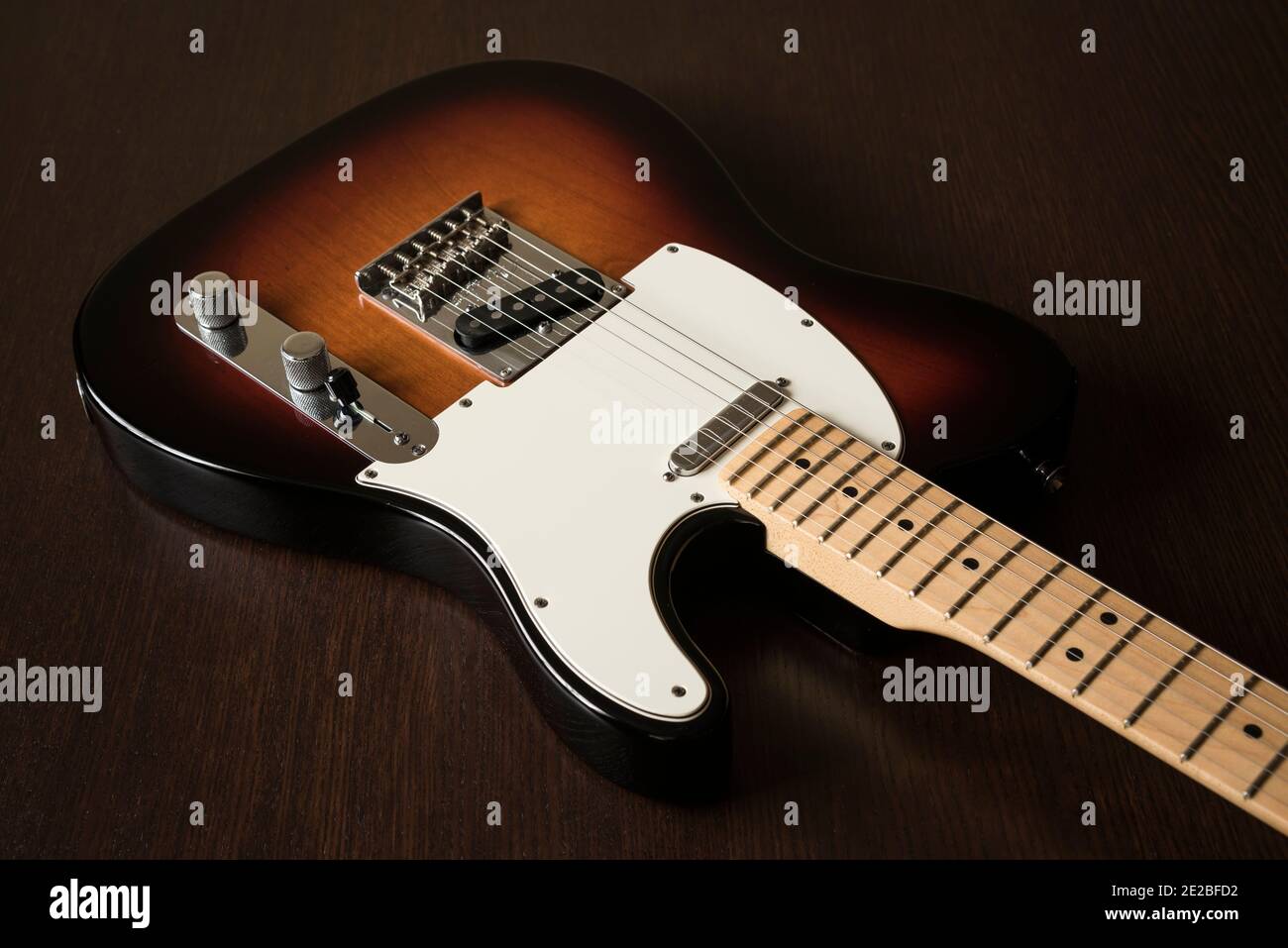 Fender American Telecaster in Vintage Sunburst on a wooden background ...