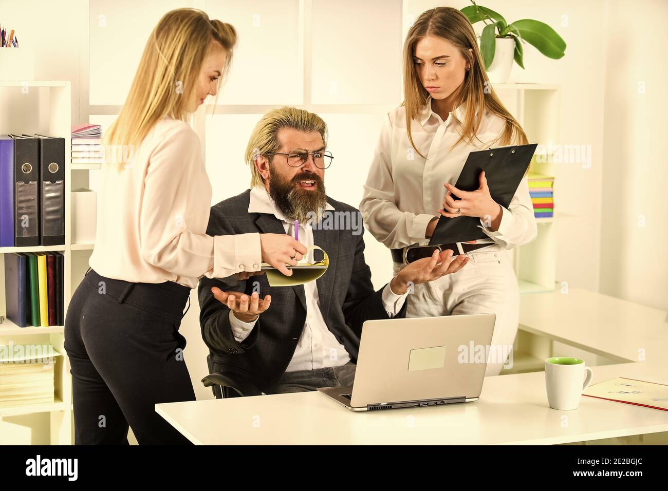 Boss and assistants hi-res stock photography and images - Alamy