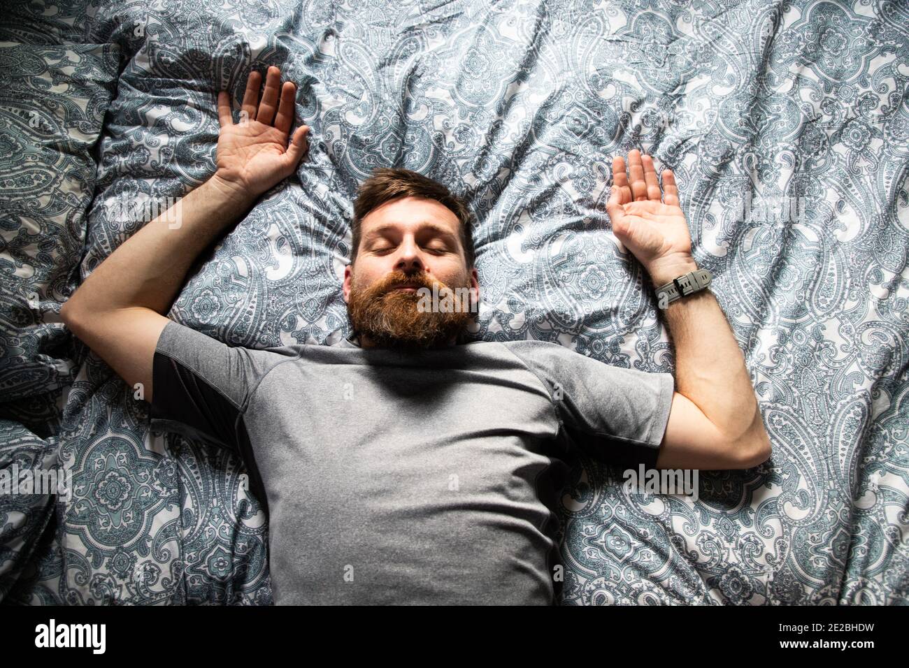 Man relaxing in bed hi-res stock photography and images - Alamy