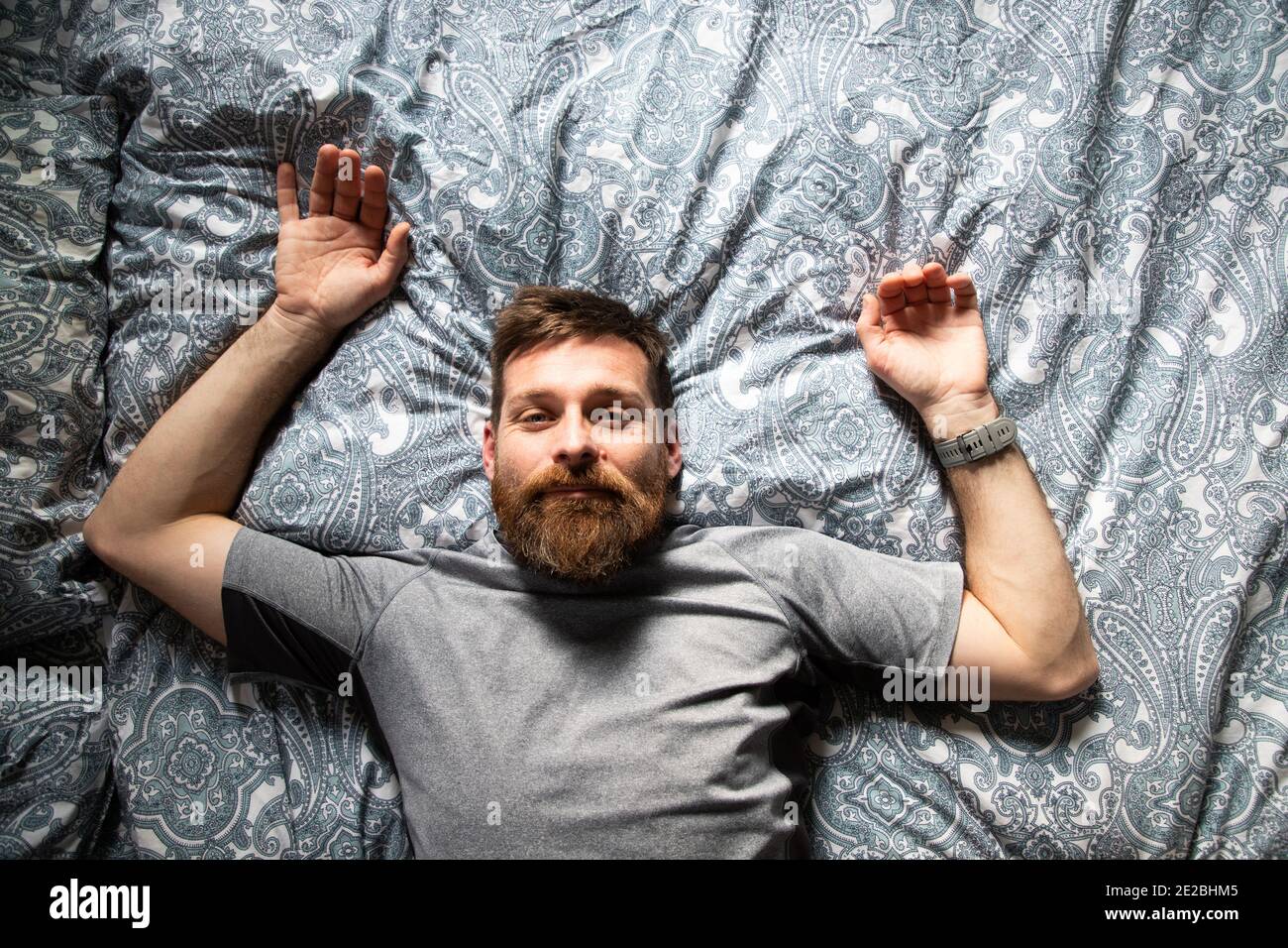 Man relaxing in bed hi-res stock photography and images - Alamy