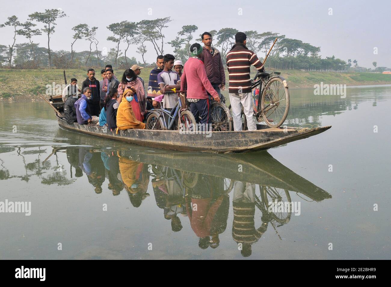 People crossing the Surma River on boat in Sylhet, Bangladesh Stock ...
