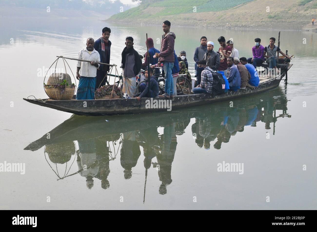People crossing the Surma River on boat in Sylhet, Bangladesh Stock ...