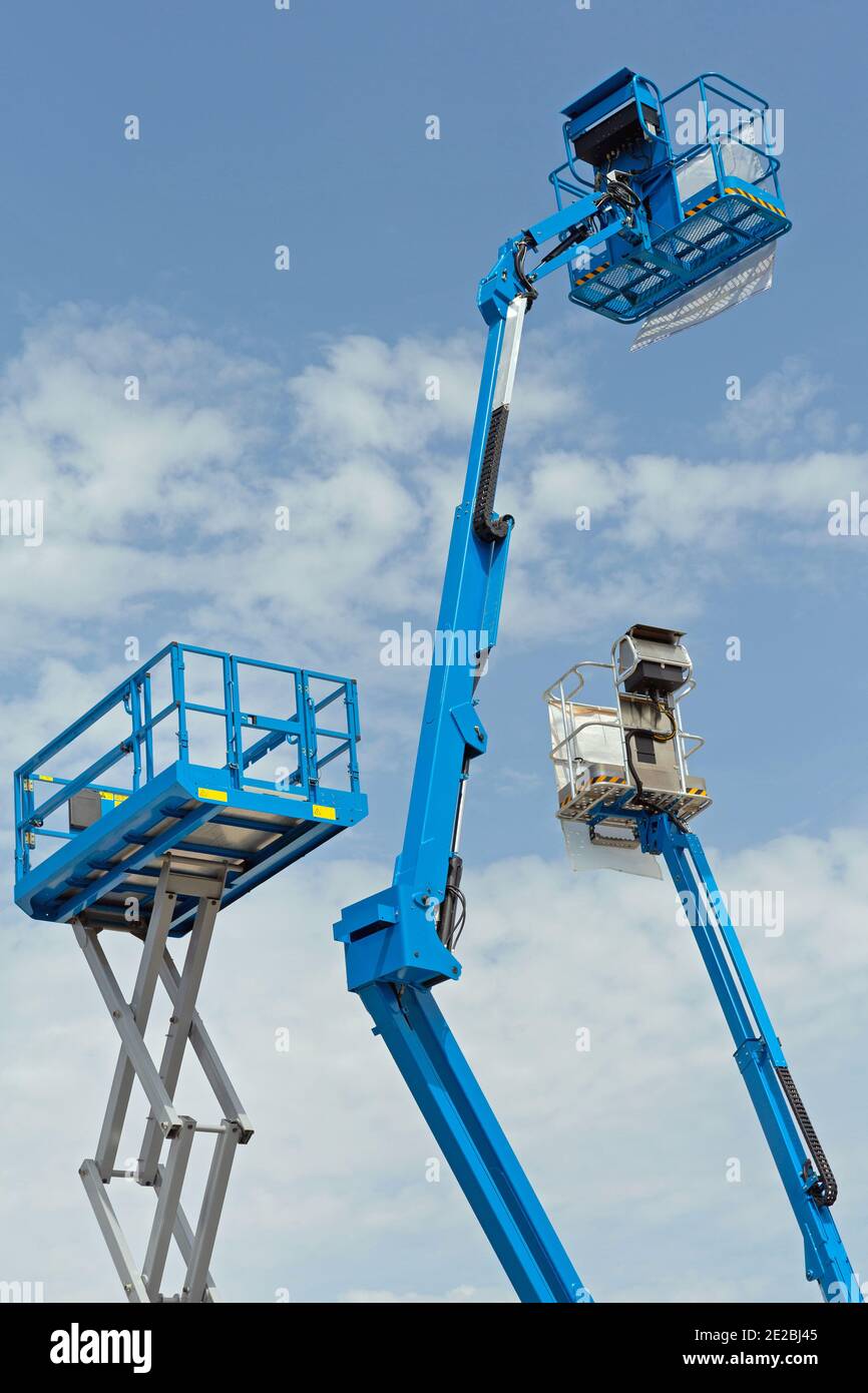 Three Elevated Work Platforms Scissor Lift and Boom Stock Photo - Alamy