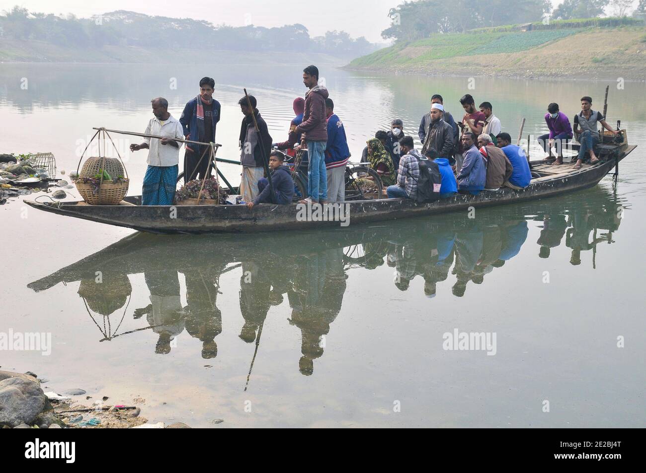 People crossing the Surma River on boat in Sylhet, Bangladesh Stock ...