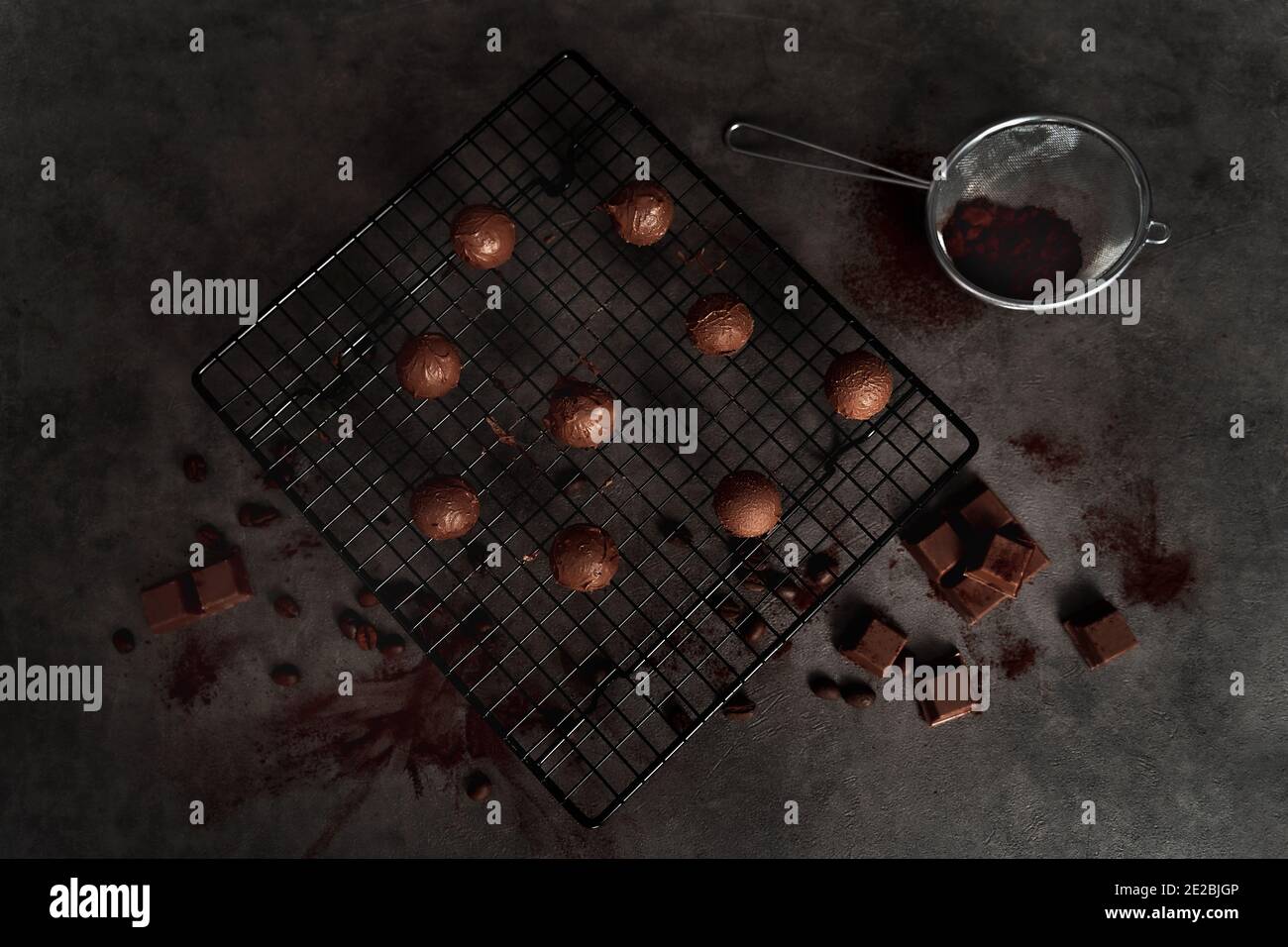 Dark chocolate truffle background in low key. Dark and moody background ...