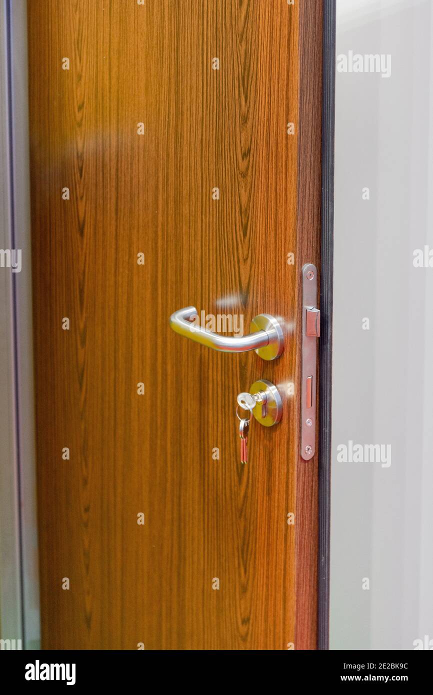 Open brown wood door hi-res stock photography and images - Alamy