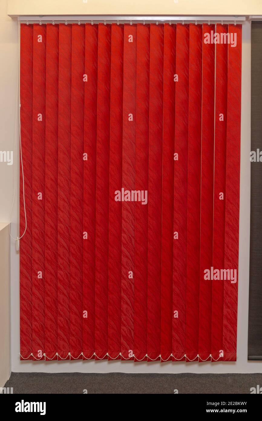 Modern Red Textile Vertical Window Blinds Stock Photo - Alamy