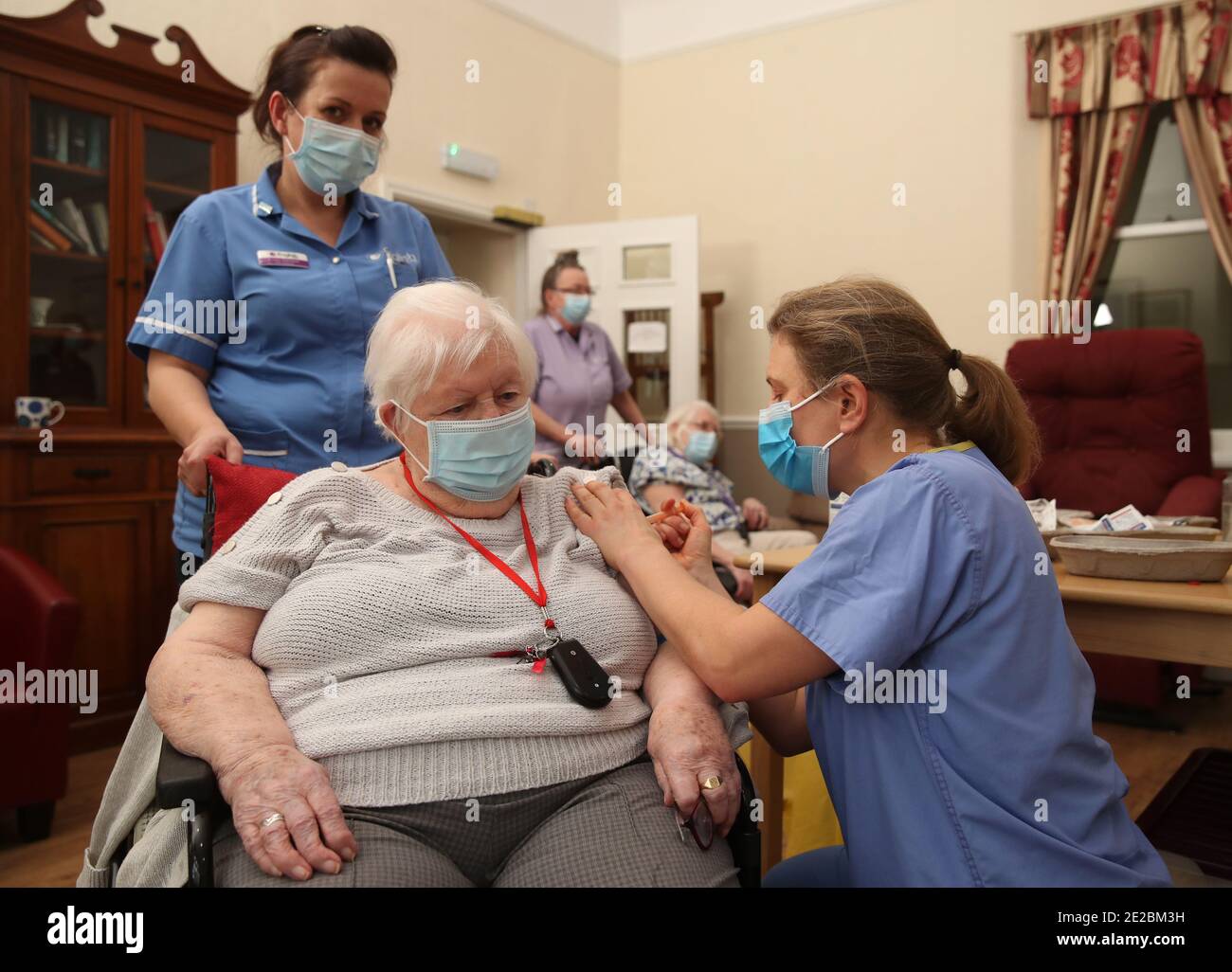 Resident Doreen Cooper receives an injection of the Oxford/AstraZeneca ...