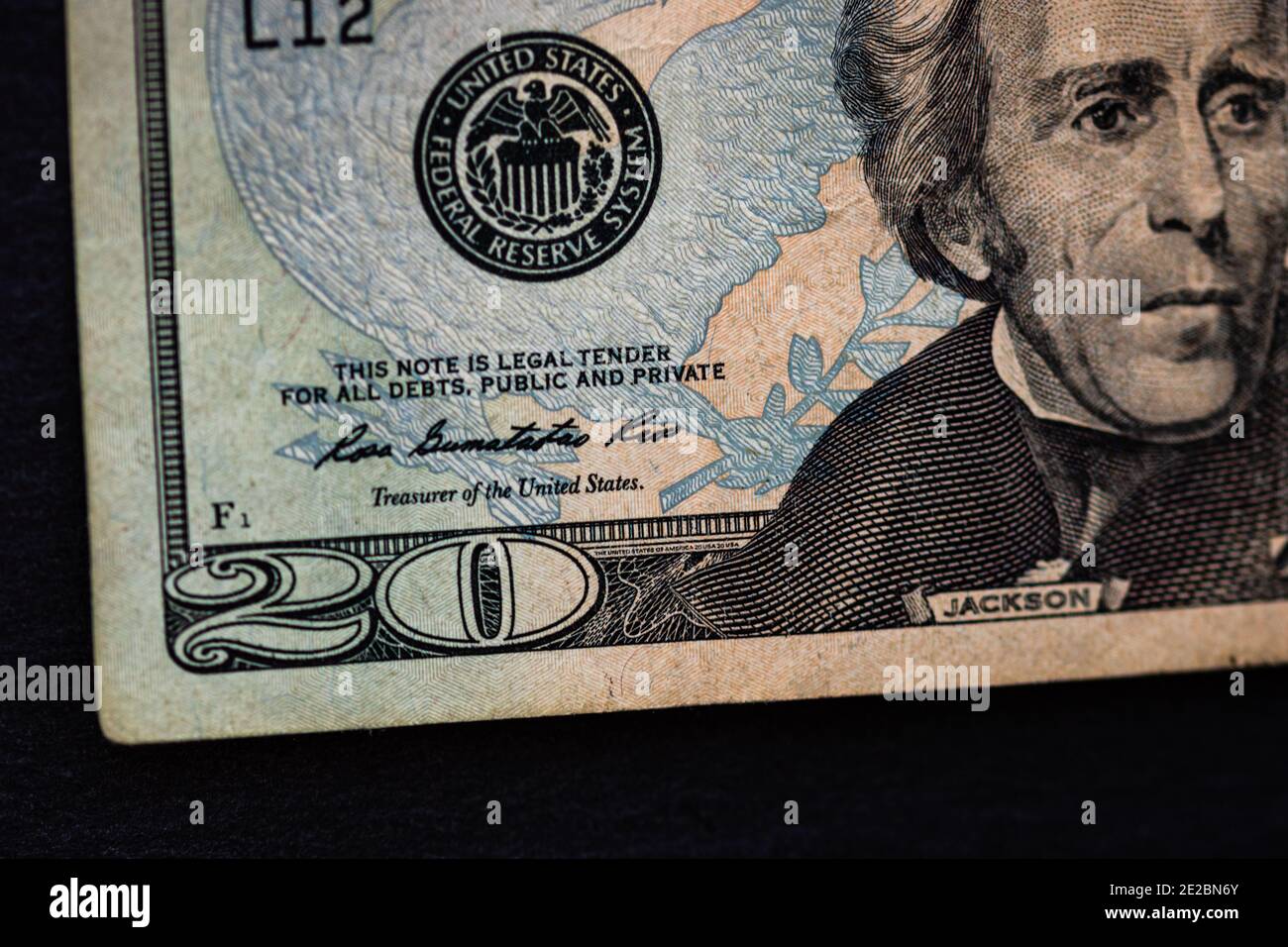 Selective focus on detail of 20 dollars banknote. Close up macro detail ...