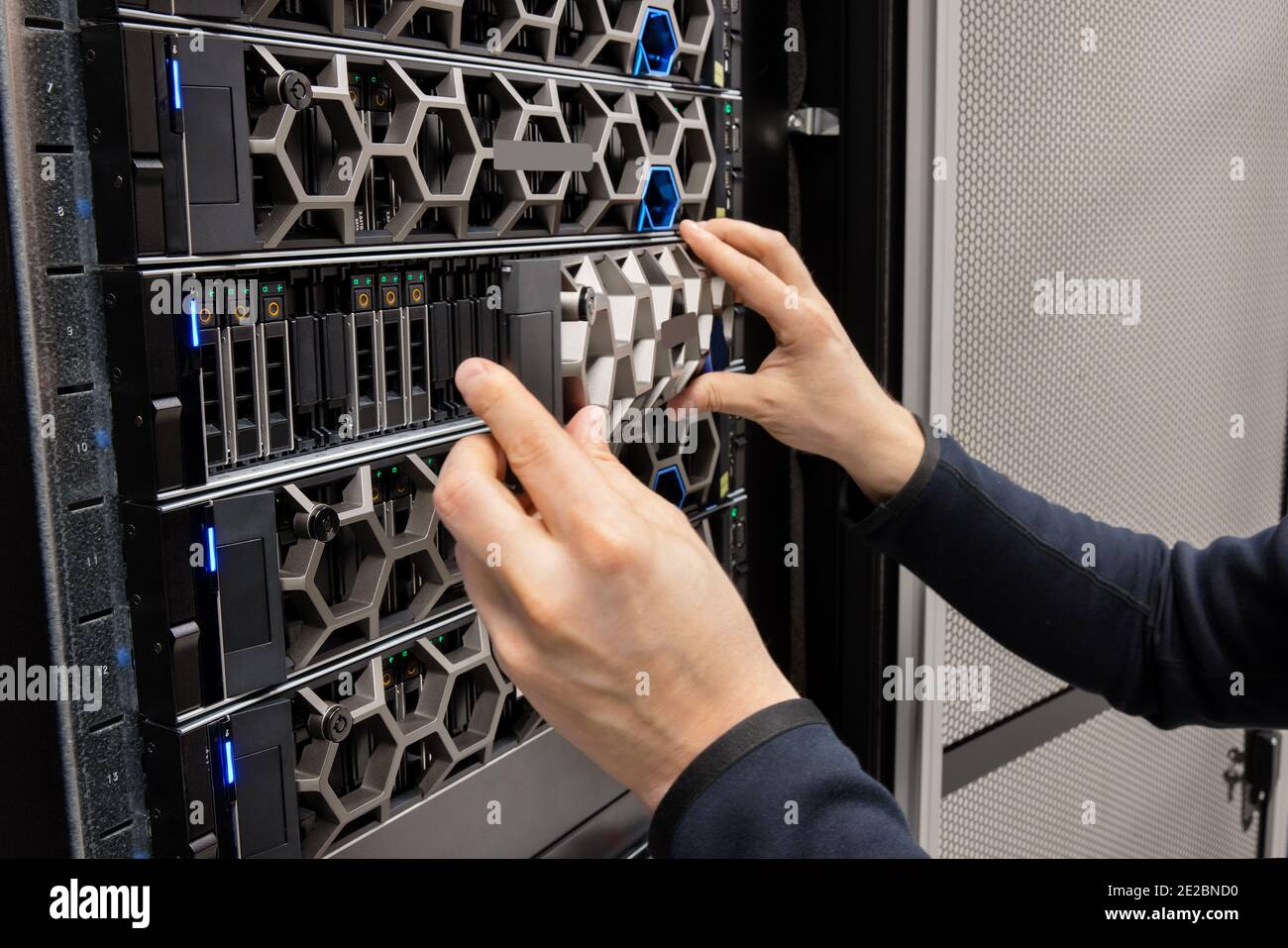 Hands Of Male Computer Engineer Monitoring Hyperconverged Servers in ...