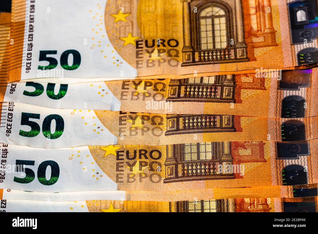 Selective focus on detail of euro banknotes. Close up macro detail of ...