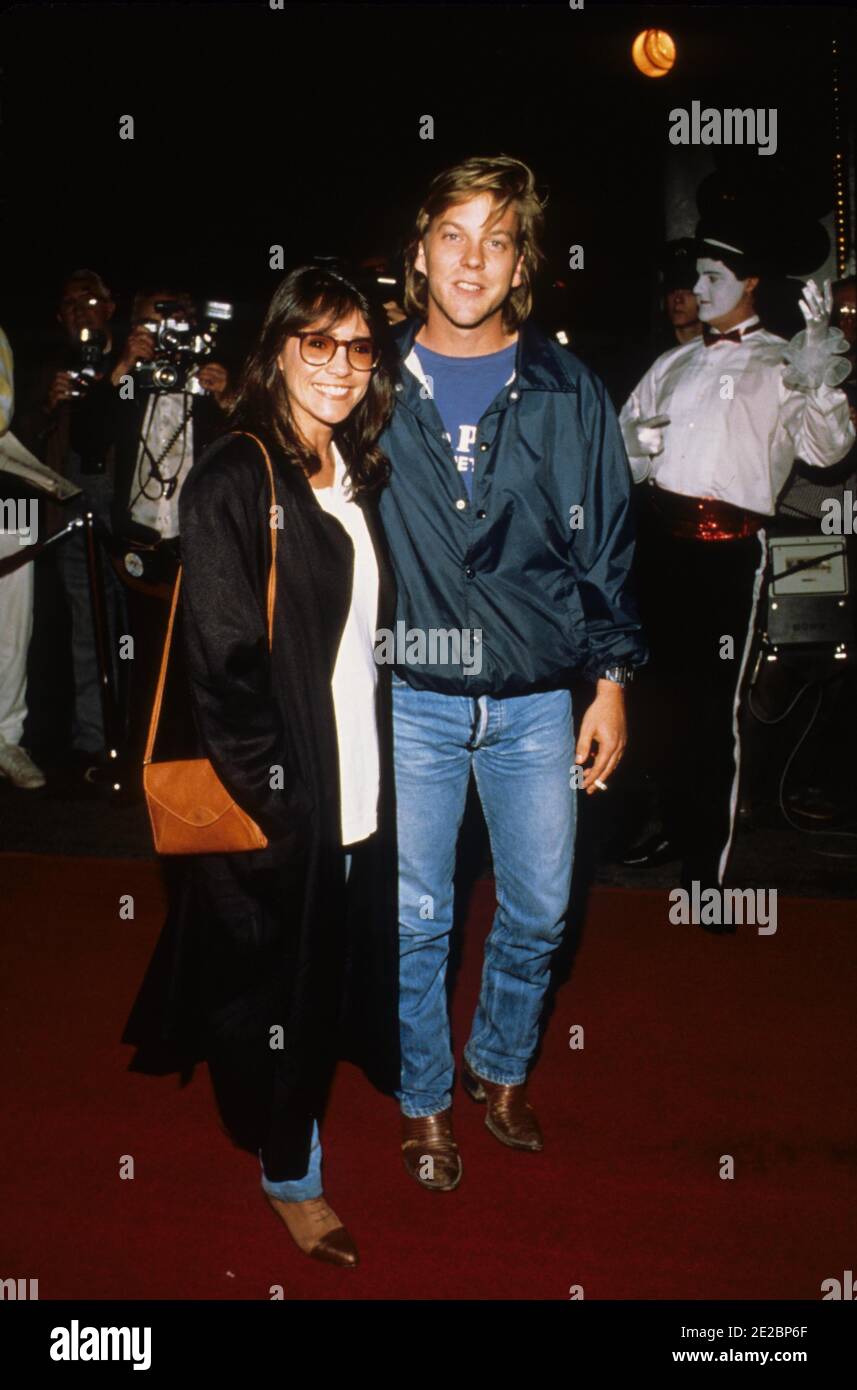KIEFER SUTHERLAND with wife 1988 Credit: Ralph Dominguez/MediaPunch ...