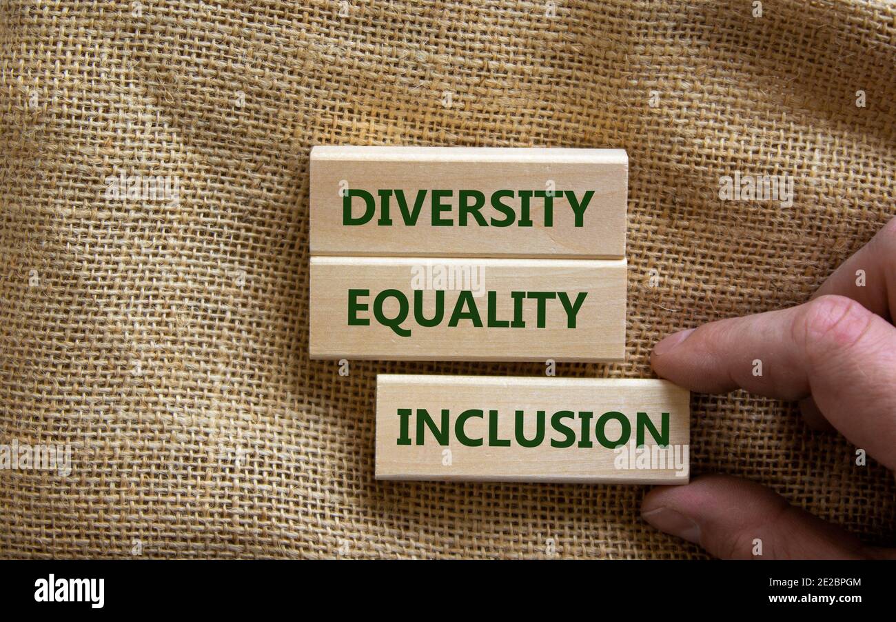 Diversity, equality and inclusion symbol. Wooden blocks with words ...