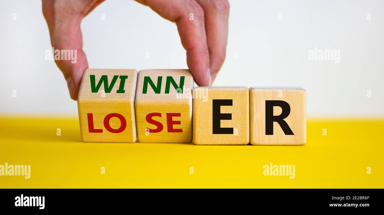 Loser or winner symbol. Businessman hand turns cubes and changes the ...