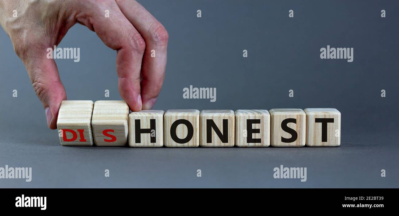Honest or dishonest symbol. Businessman hand turns cubes and changes ...